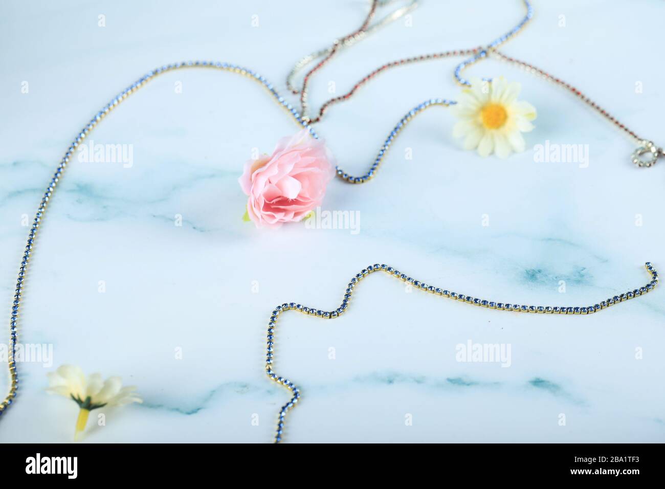Blue flower on marble background hi-res stock photography and images ...