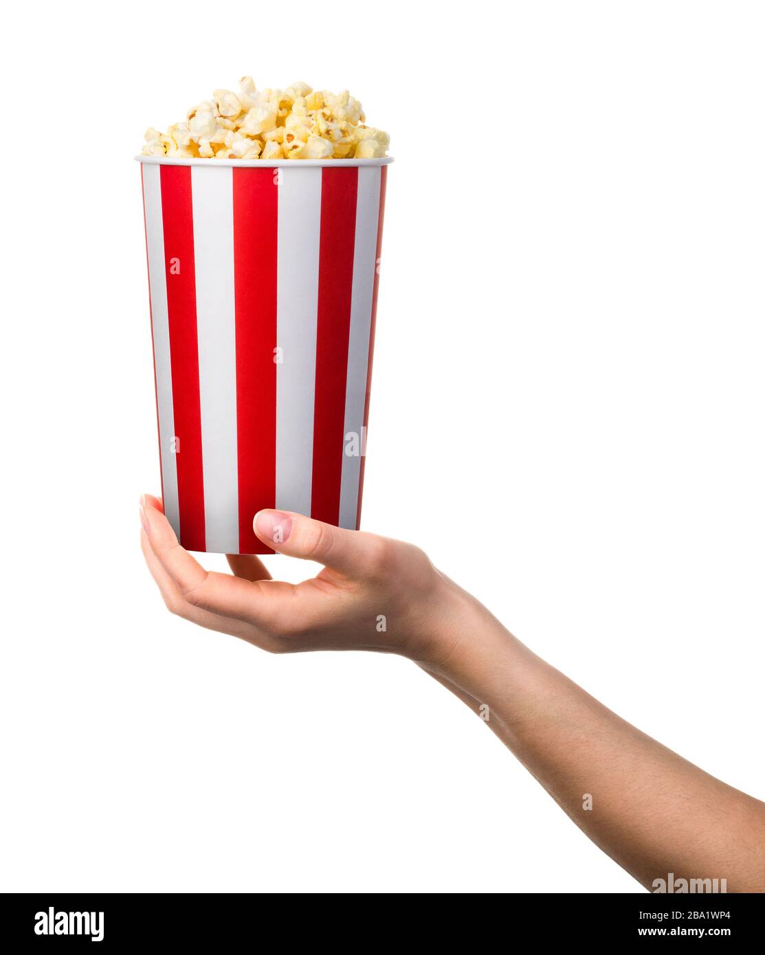 Woman hand holding striped bucket with popcorn isolated on white ...