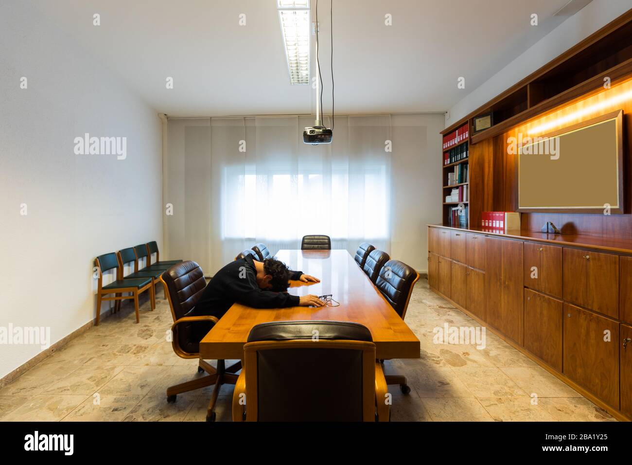 Man sitting alone meeting table hi-res stock photography and images - Alamy