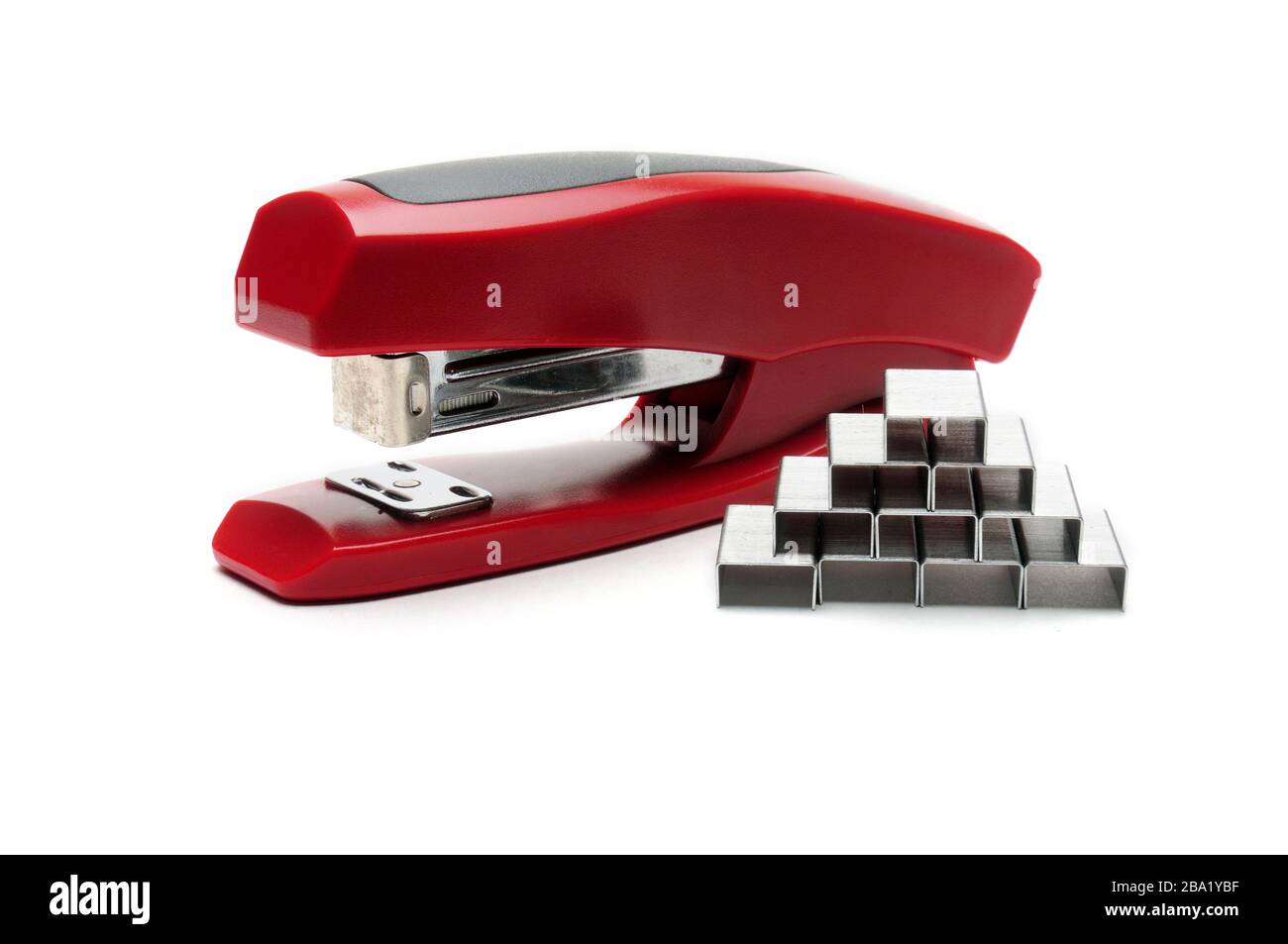 Red office stapler on an isolated white background Stock Photo - Alamy