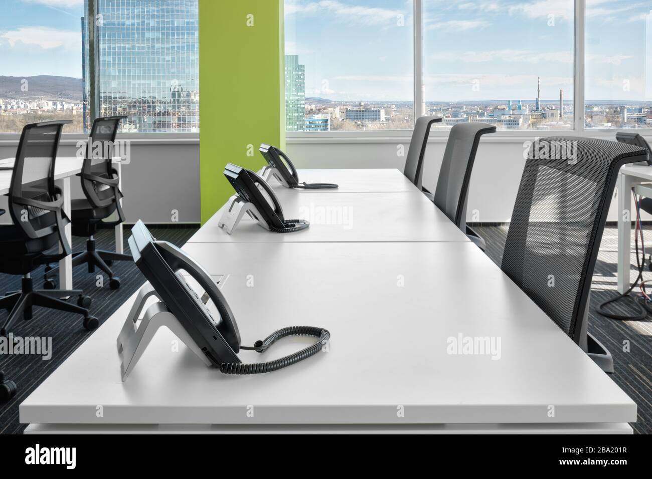 detail of work desk employee telephone service Stock Photo - Alamy