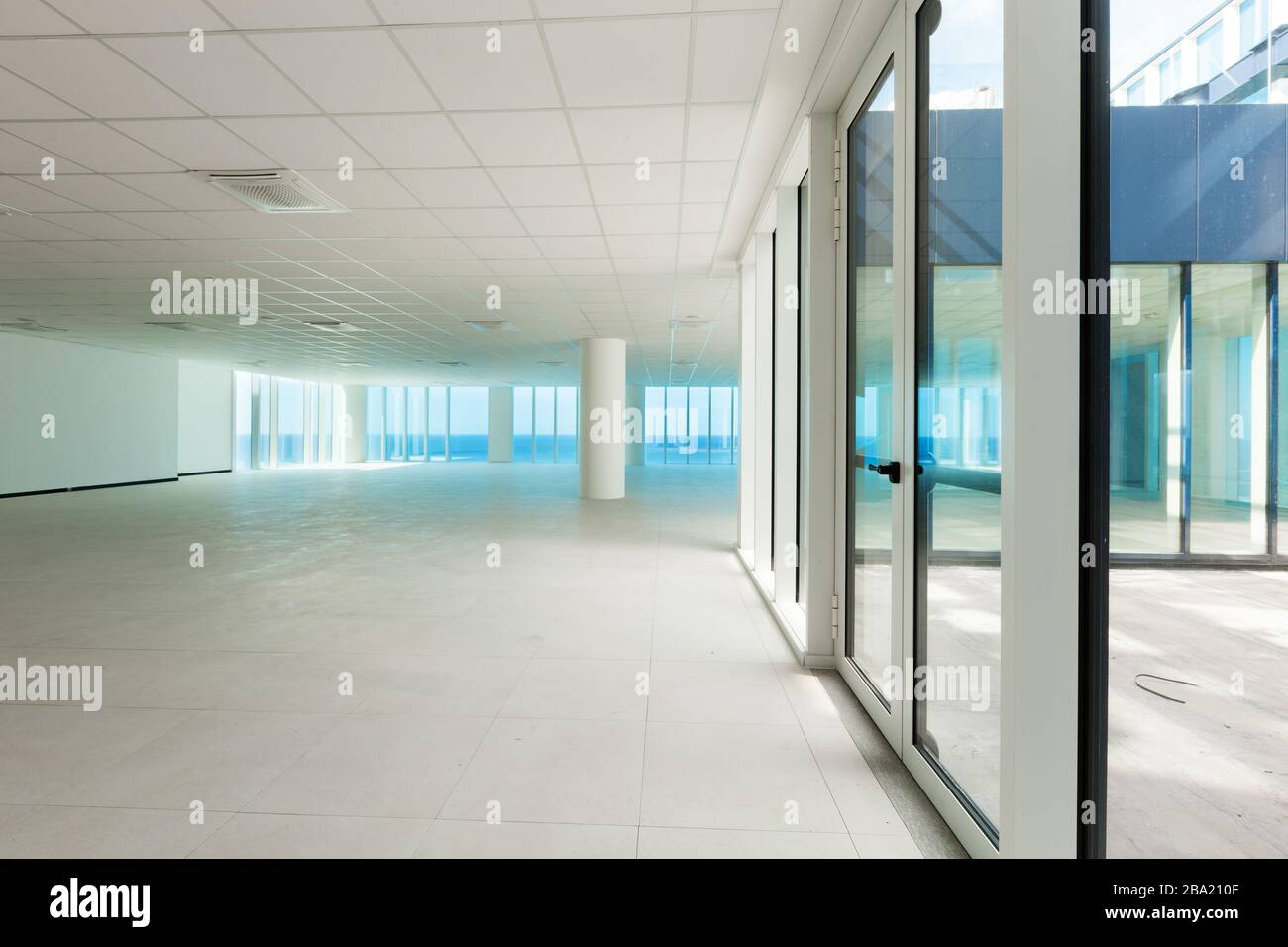 Interior, glass wall in the office building Stock Photo - Alamy