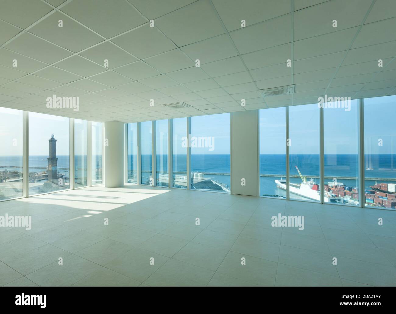 Interior, wide open space, skyscraper, windows overlooking the sea ...