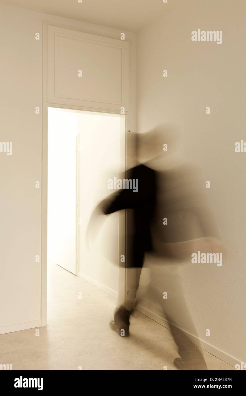 Person through the door, moved Stock Photo - Alamy