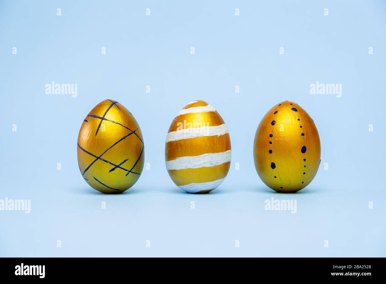 Happy Easter. Three easter eggstrendy colored classic blue, white and ...