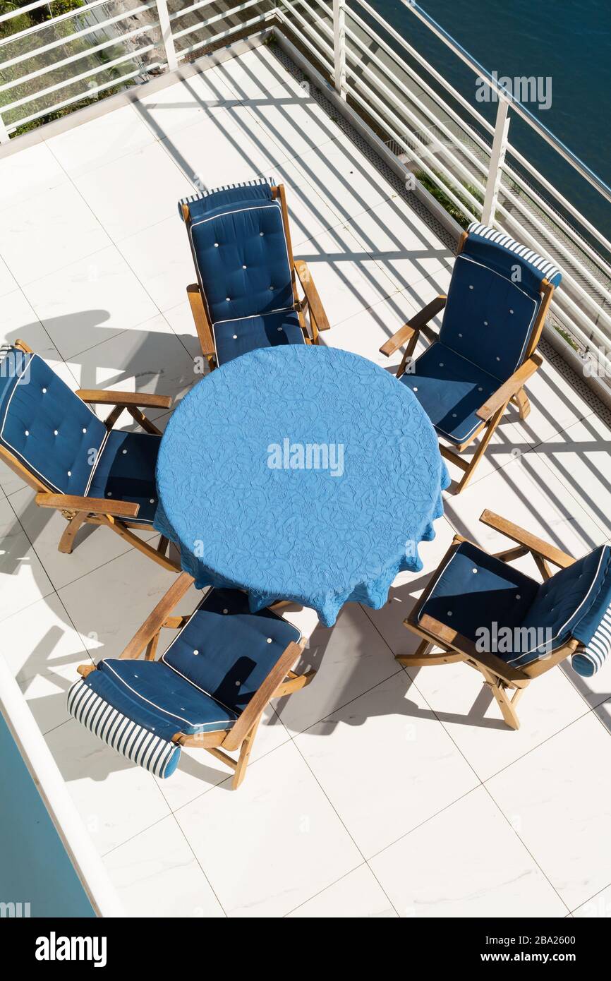terrace of a penthouse, blue table with chairs, top view Stock Photo ...