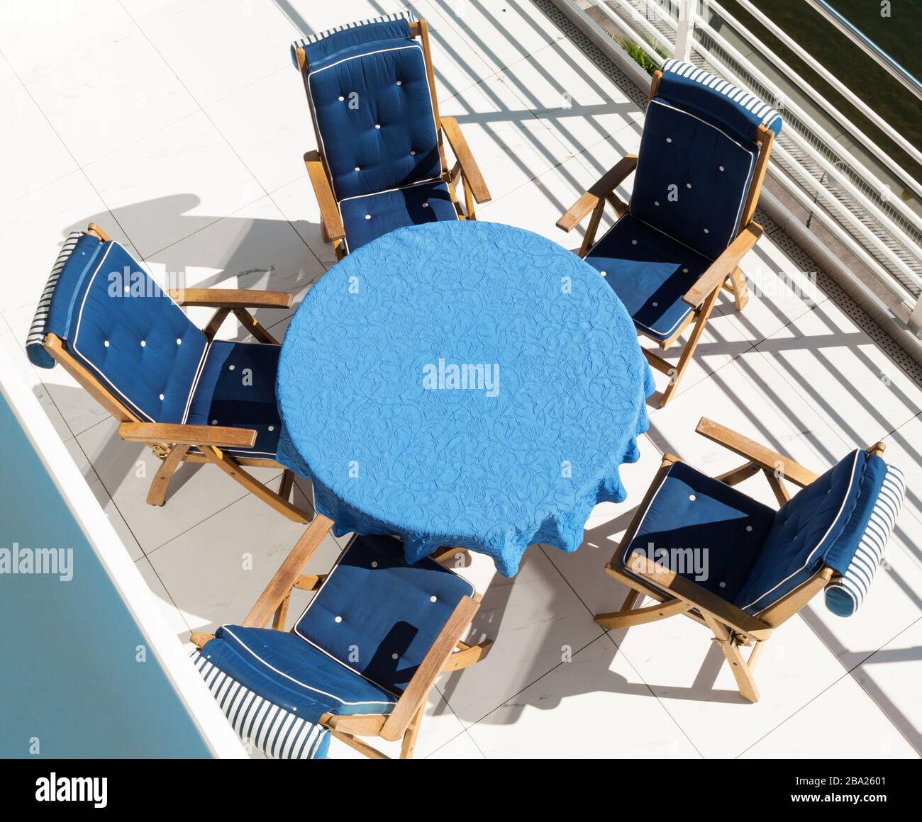 terrace of a penthouse, blue table with chairs, top view Stock Photo ...
