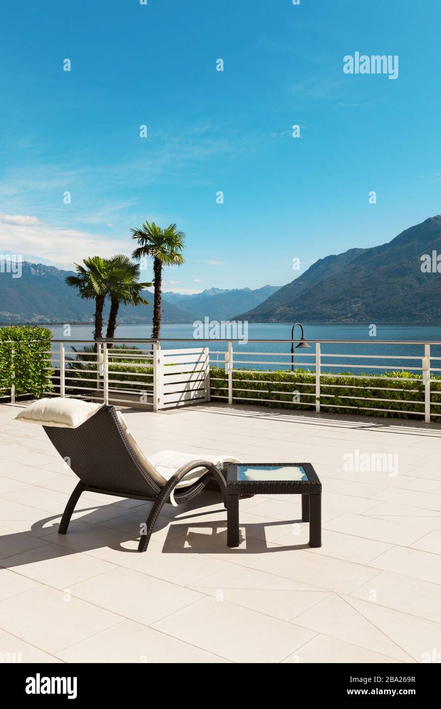 beautiful terrace of a penthouse overlooking the lake, outside Stock ...