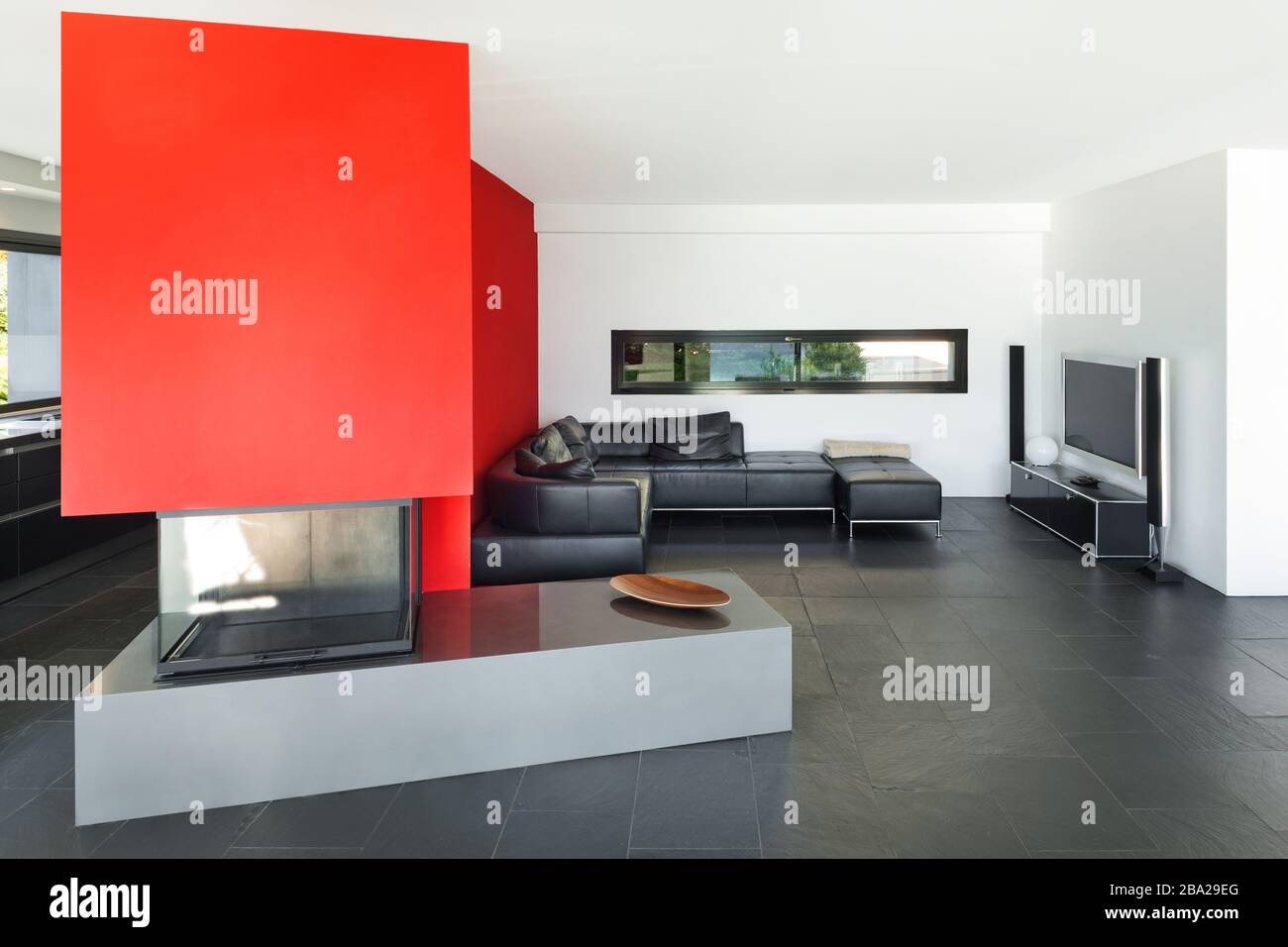 Interior, modern house, living room with fireplace Stock Photo - Alamy