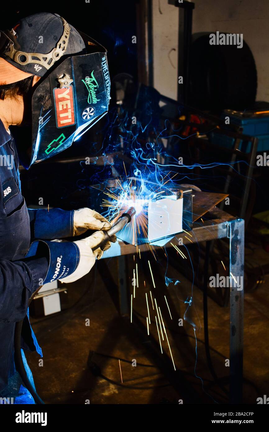 MIG Welder in action Stock Photo - Alamy