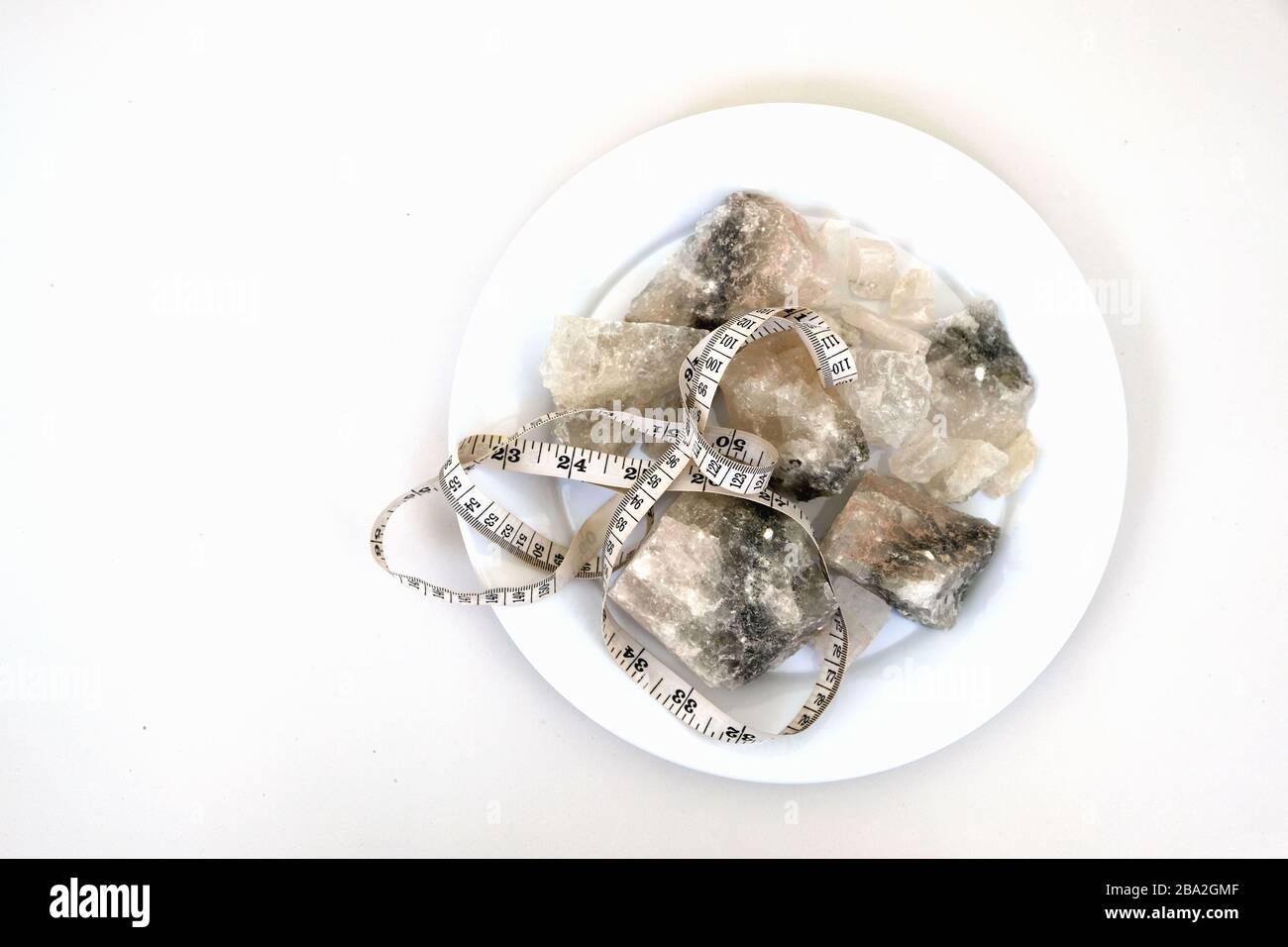 salt and weight gain, the harm of salt for man Stock Photo - Alamy