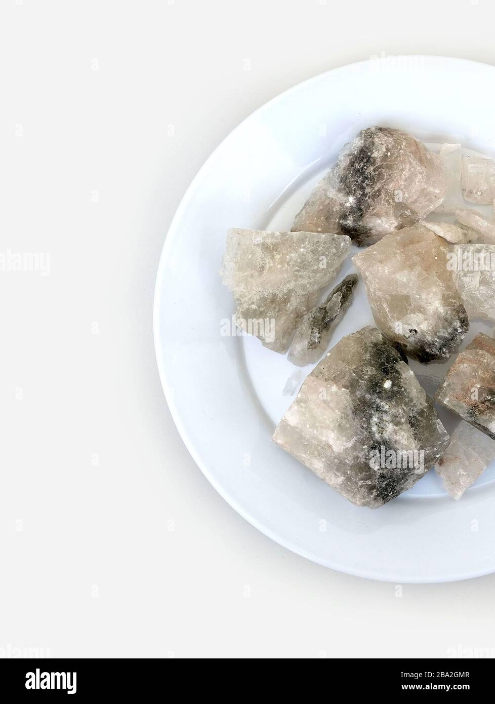 salt and weight gain, the harm of salt for man Stock Photo - Alamy