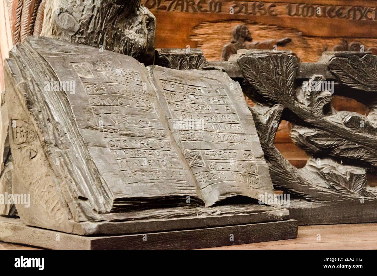 Ancient stone book statue in st Vitus Cathedral Stock Photo - Alamy
