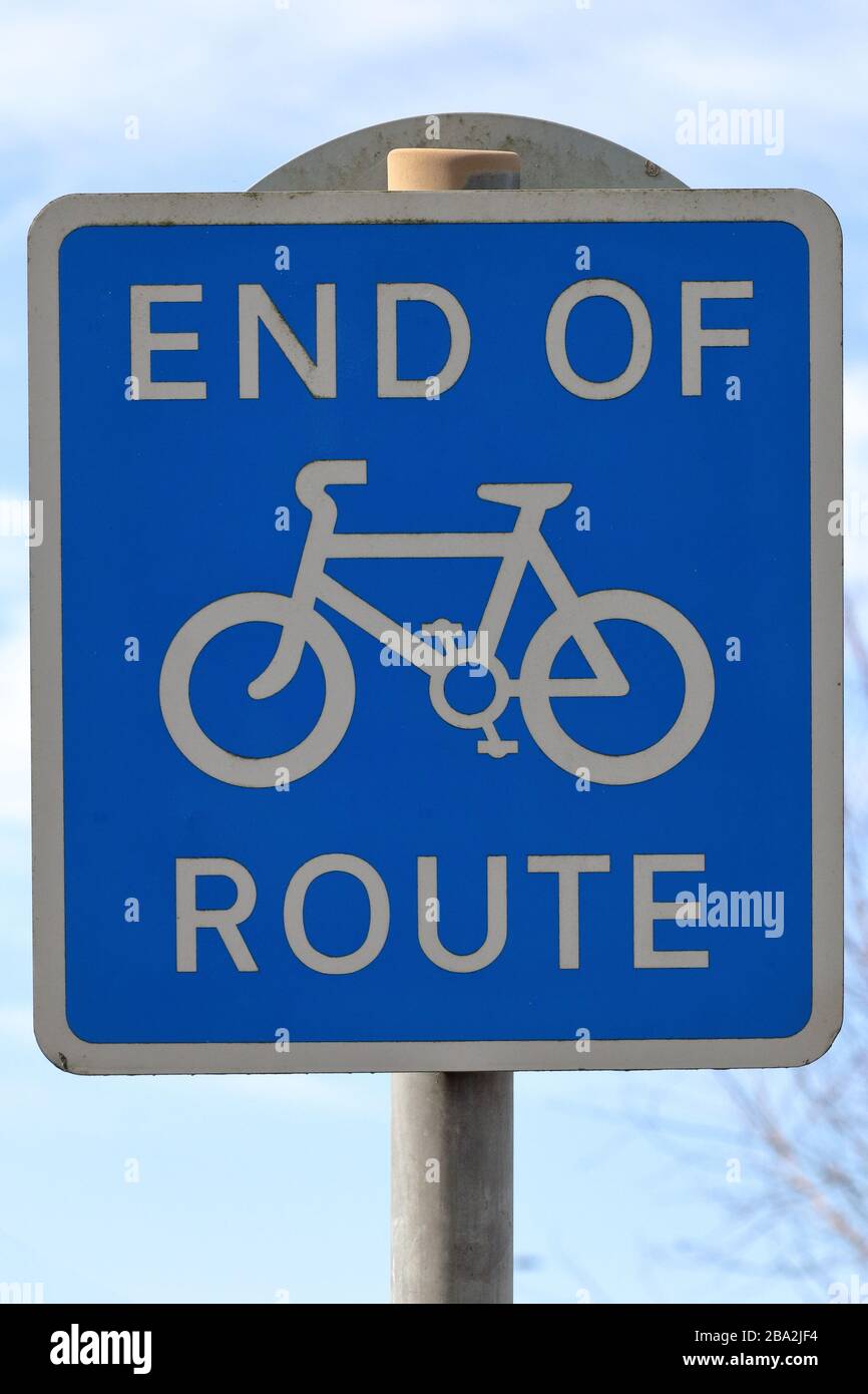 Traffic sign showing the end of a cycle route Stock Photo - Alamy