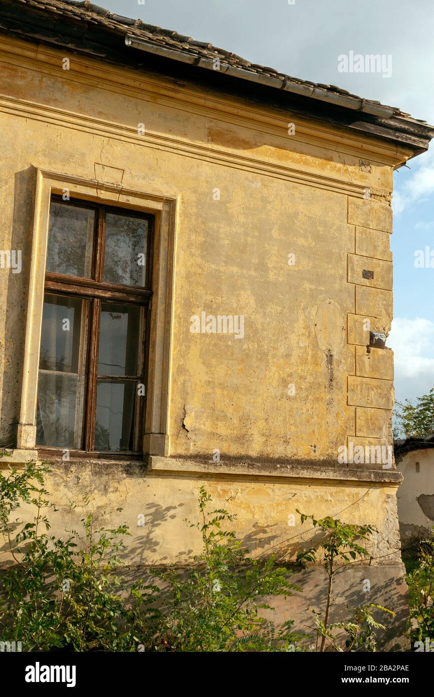 Abandoned old house with faded paint Stock Photo - Alamy