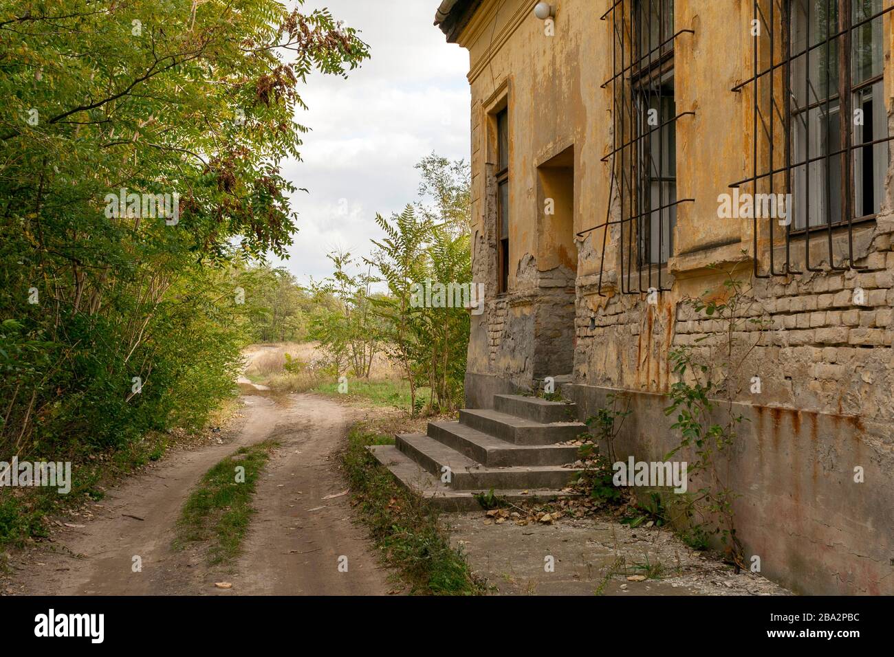 Abandoned old house with faded paint Stock Photo - Alamy