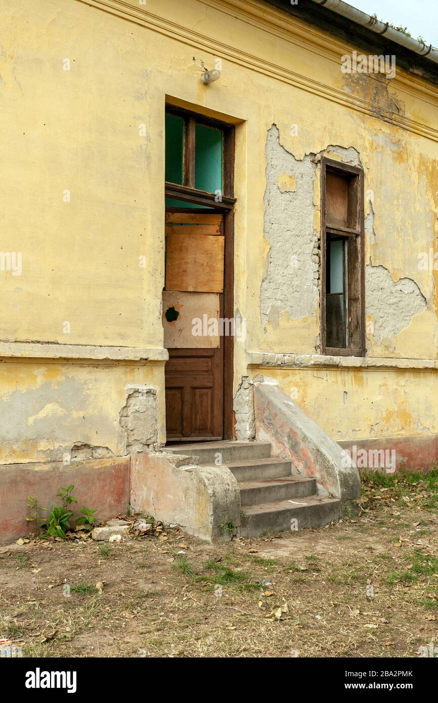 Abandoned old house with faded paint Stock Photo - Alamy