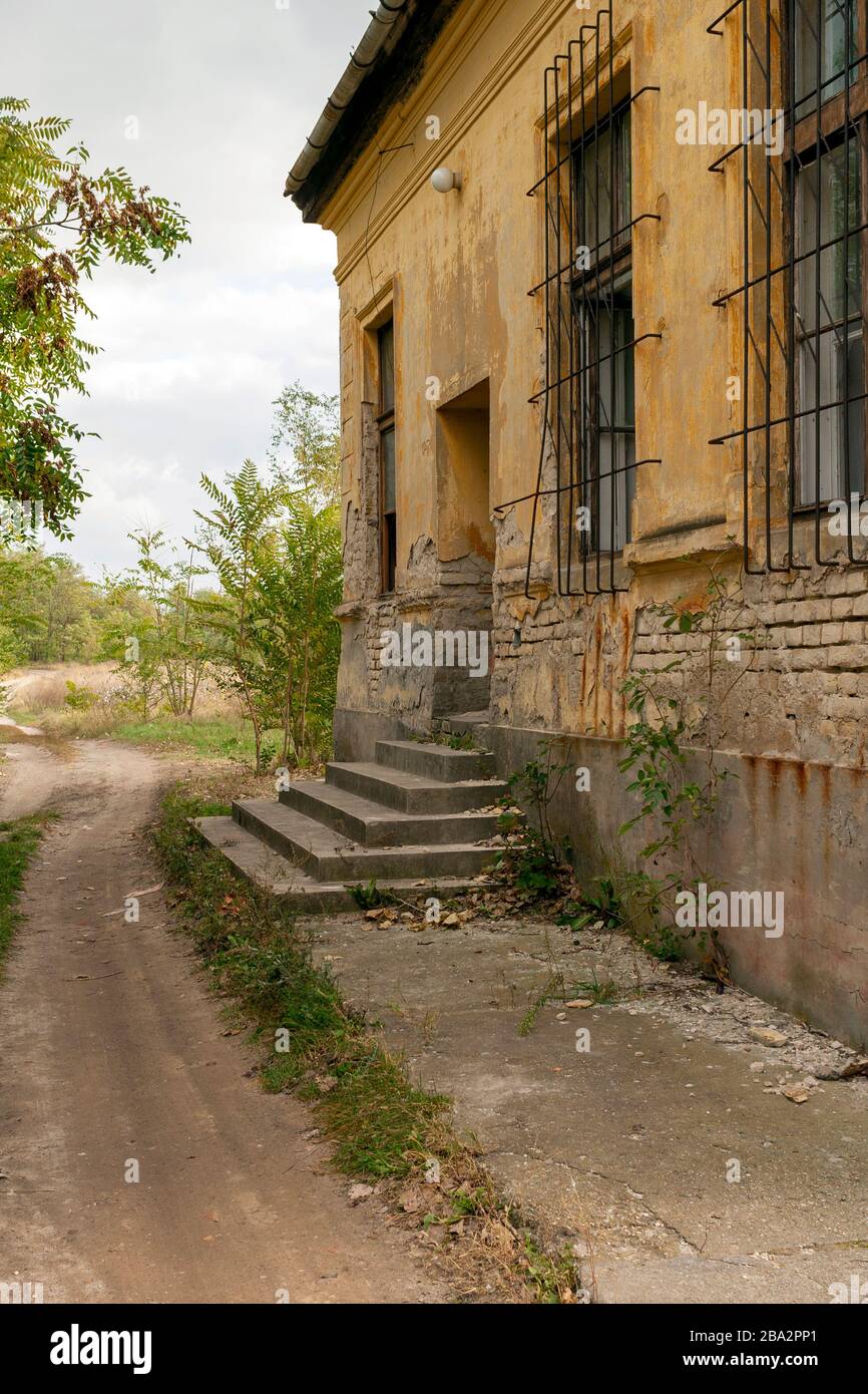 Abandoned old house with faded paint Stock Photo - Alamy
