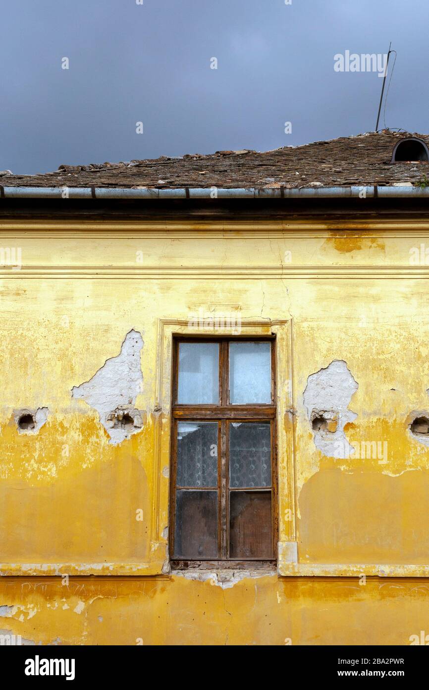 Abandoned old house with faded paint Stock Photo - Alamy