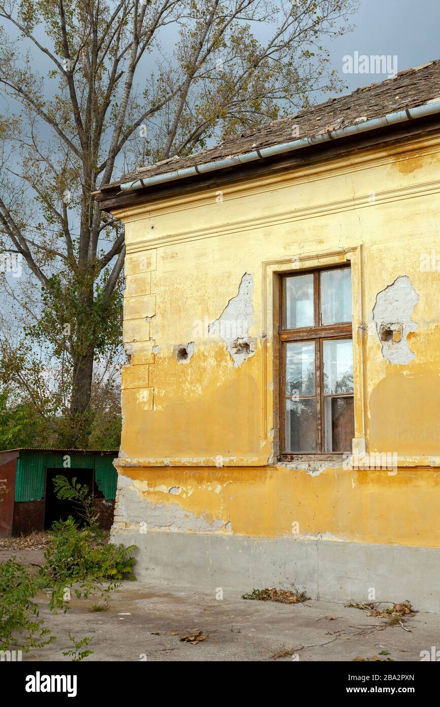 Abandoned old house with faded paint Stock Photo - Alamy