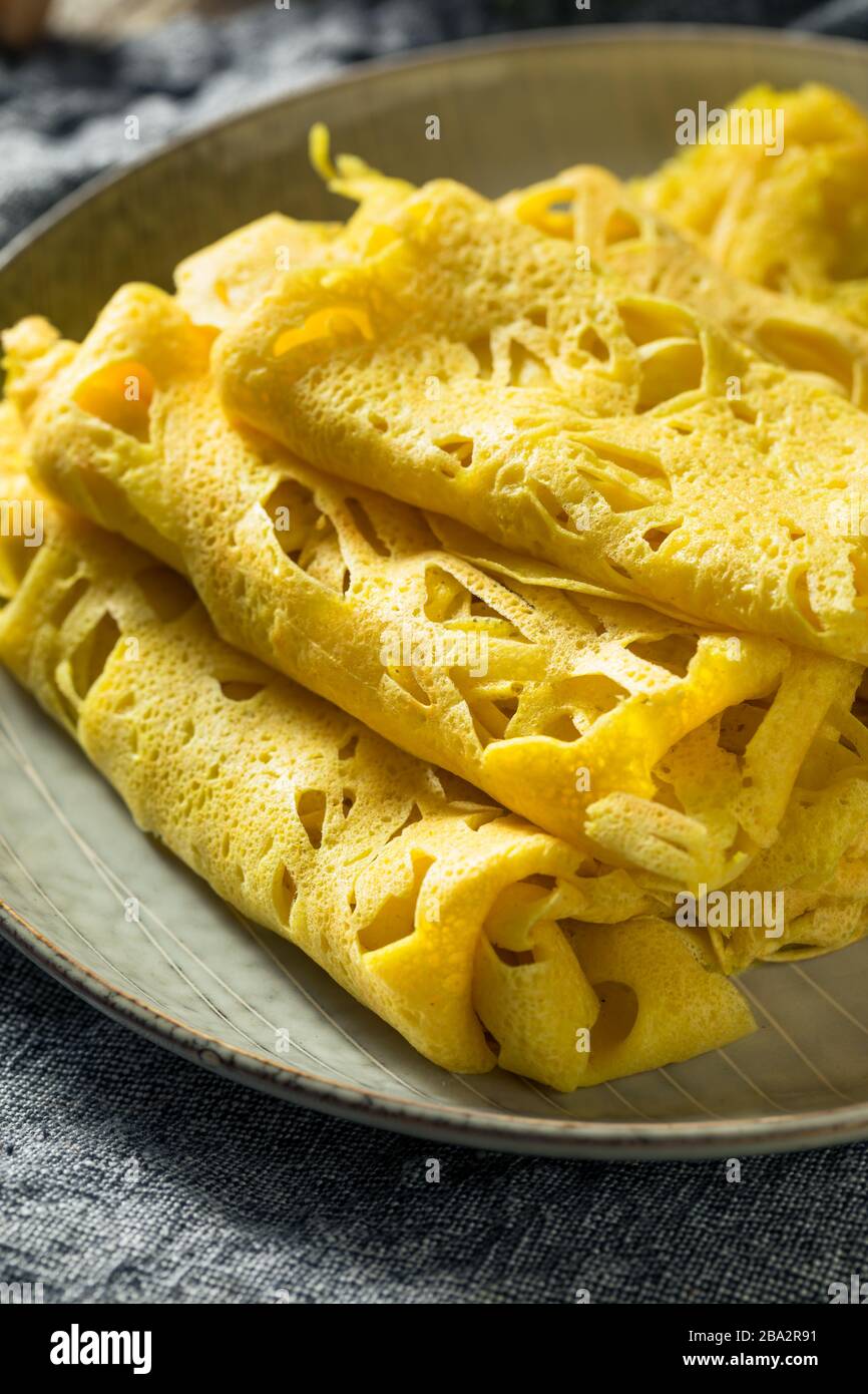 Homemade Malaysian Net Crepe Roti Jala Ready to Eat Stock Photo - Alamy