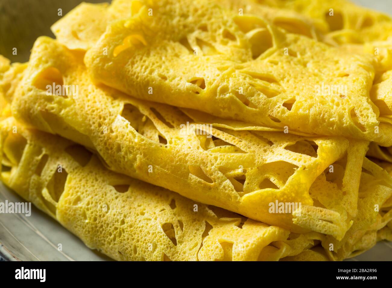 Homemade Malaysian Net Crepe Roti Jala Ready to Eat Stock Photo - Alamy