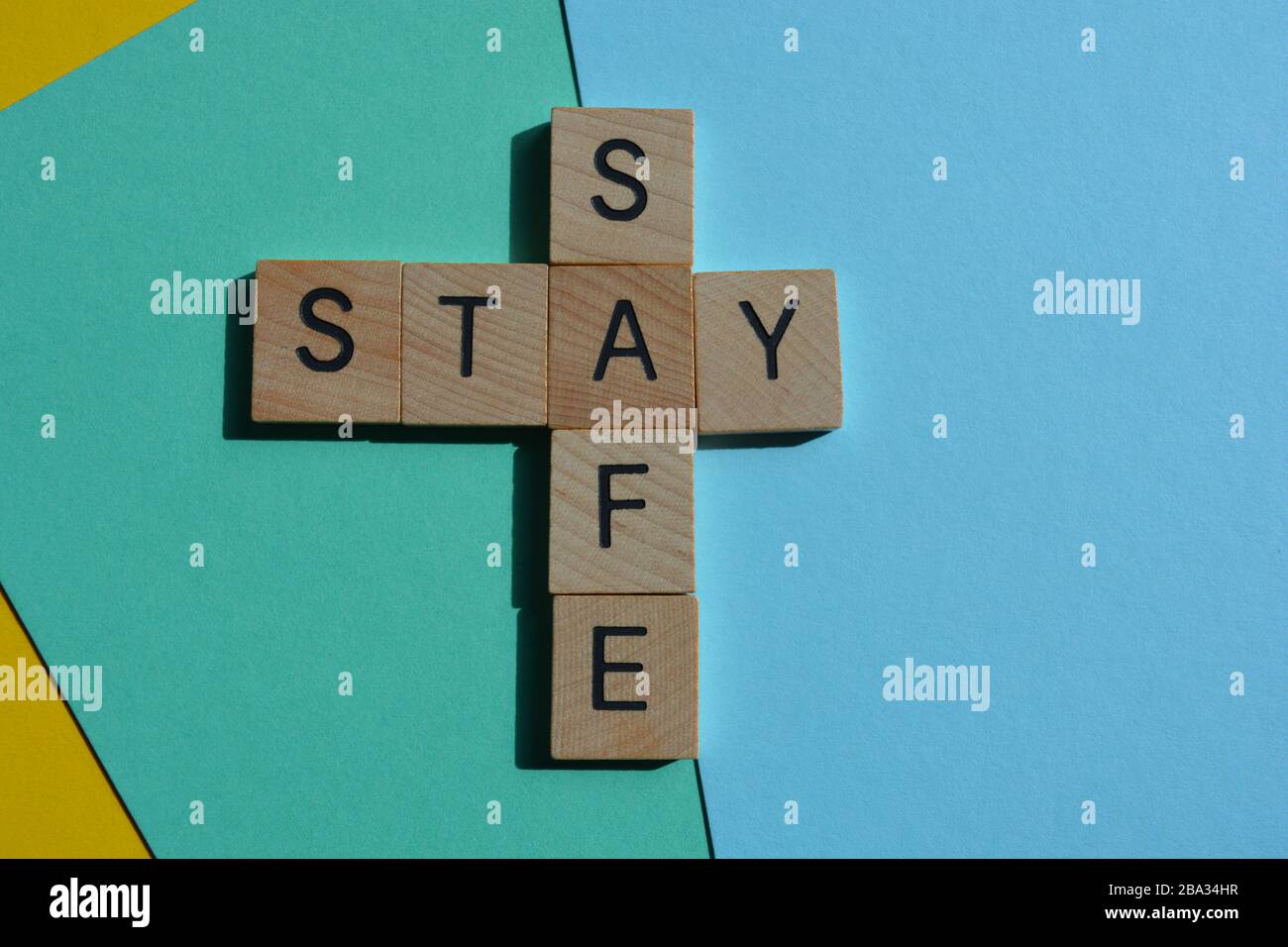 Stay Safe in 3d wooden letters on colorful background Stock Photo - Alamy