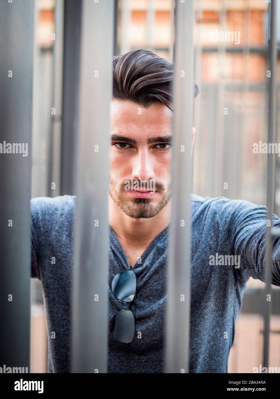 Man behind bars hi-res stock photography and images - Alamy