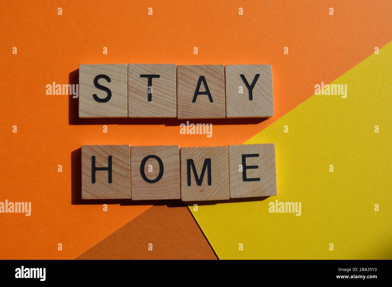 Stay Home, words on coloured background Stock Photo - Alamy
