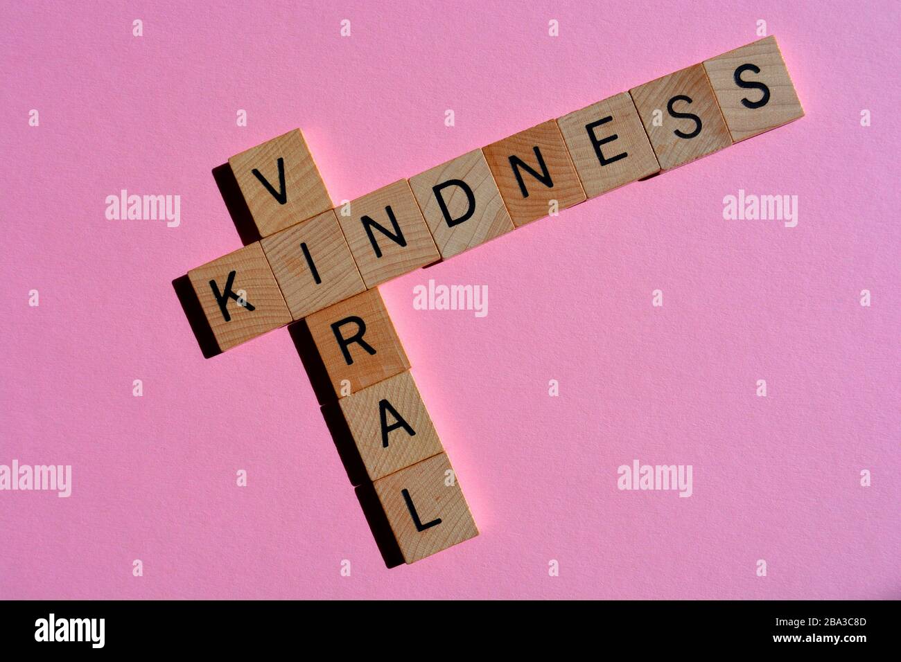 Viral Kindness, words on pink with copy space Stock Photo - Alamy