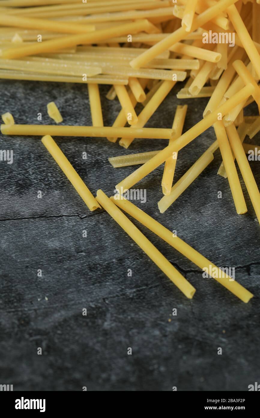 Homemade fresh spaghetti on the top side of the background Stock Photo ...