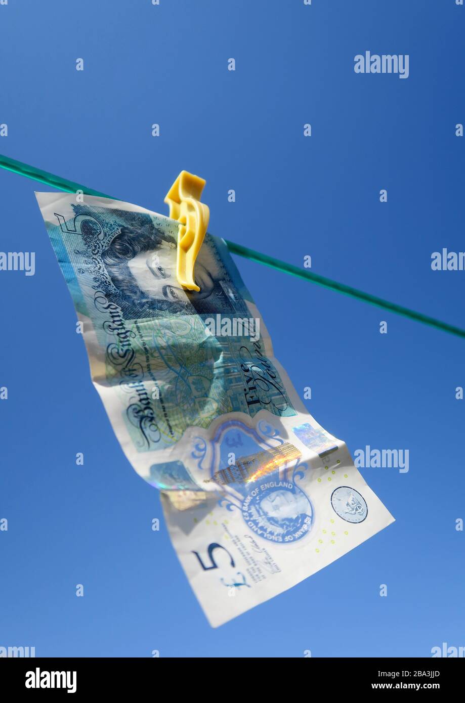 Money hanging out dry hi-res stock photography and images - Alamy
