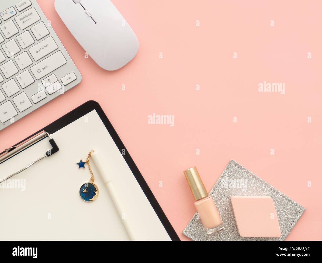 Keyboard mouse, clipboard with pen makeup tools, cosmetic products ...