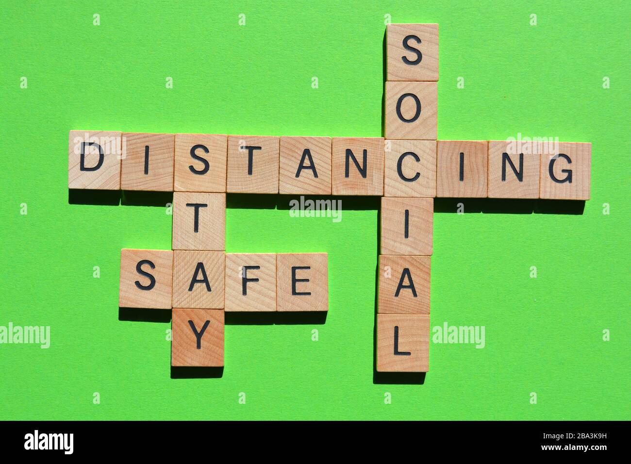 Stay Safe, Social Distancing, Yes, crossword on green Stock Photo - Alamy