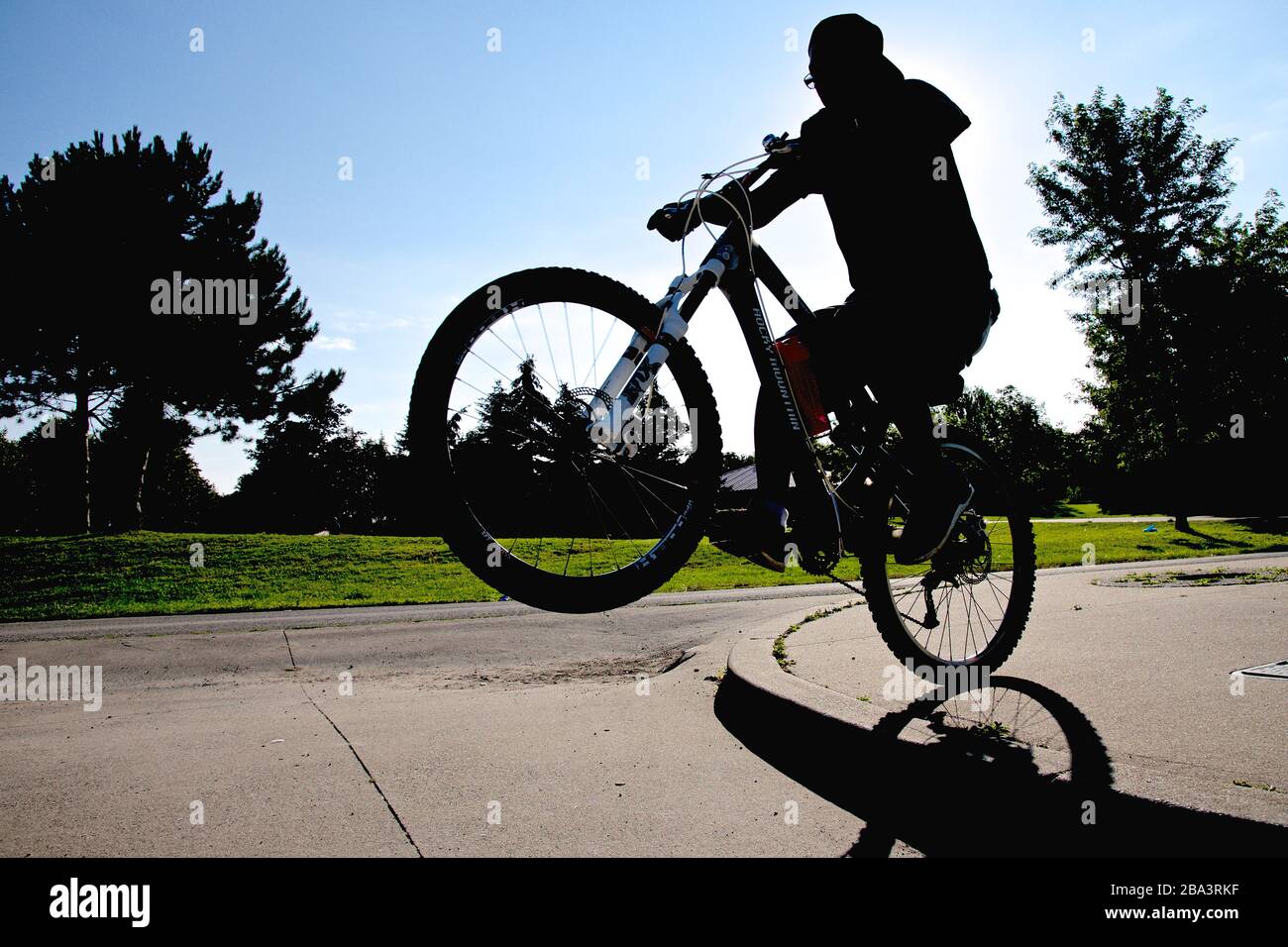 Back view man bike hi-res stock photography and images - Alamy