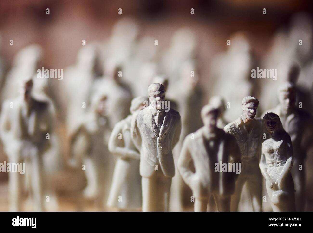 Crowd of miniature plastic people in white Stock Photo - Alamy