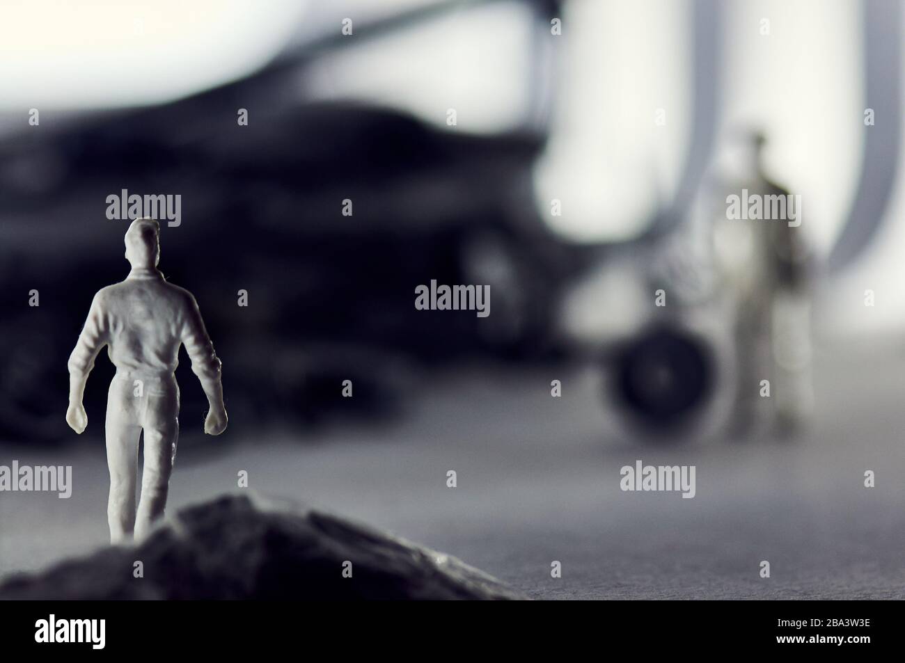 miniature plastic person from back Stock Photo - Alamy