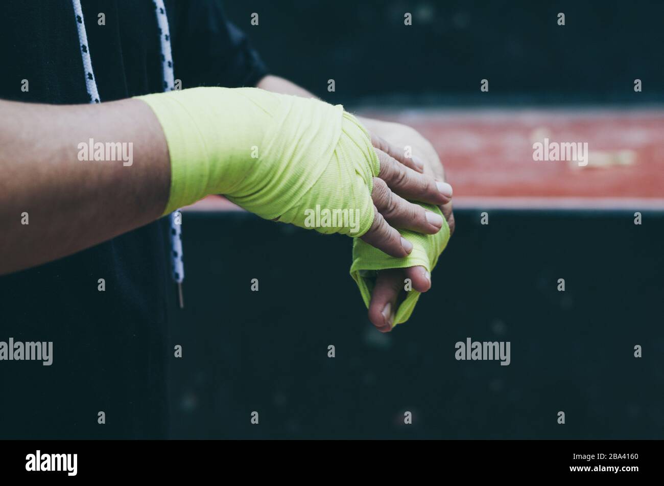 Boxer bandages around their arms ready to fight Stock Photo - Alamy