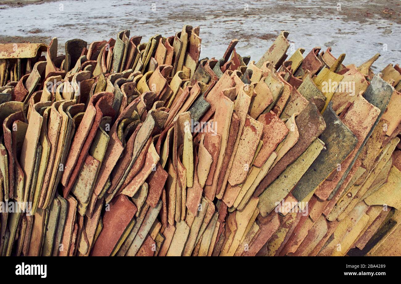 broken roof tiles on the ground Stock Photo - Alamy