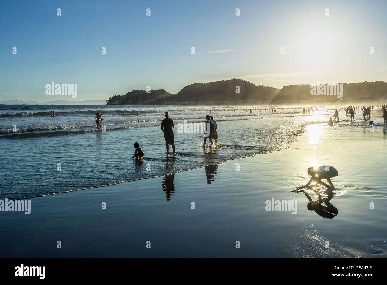 Sunset view of Yuigahama Beach at Kamakura, a popular sandy beach for ...