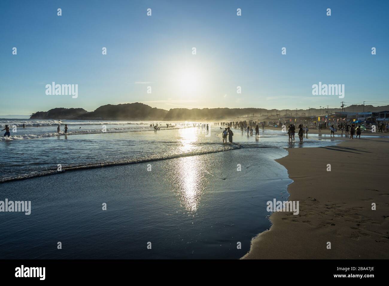 Sunset view of Yuigahama Beach at Kamakura, a popular sandy beach for ...