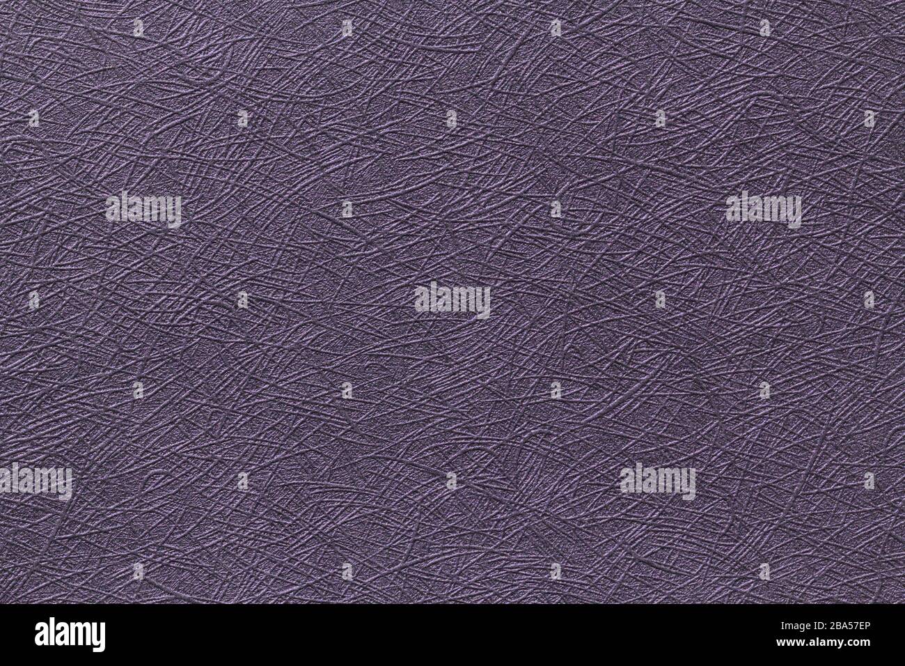 Background close up of deep purple Japanese origami craft paper with ...