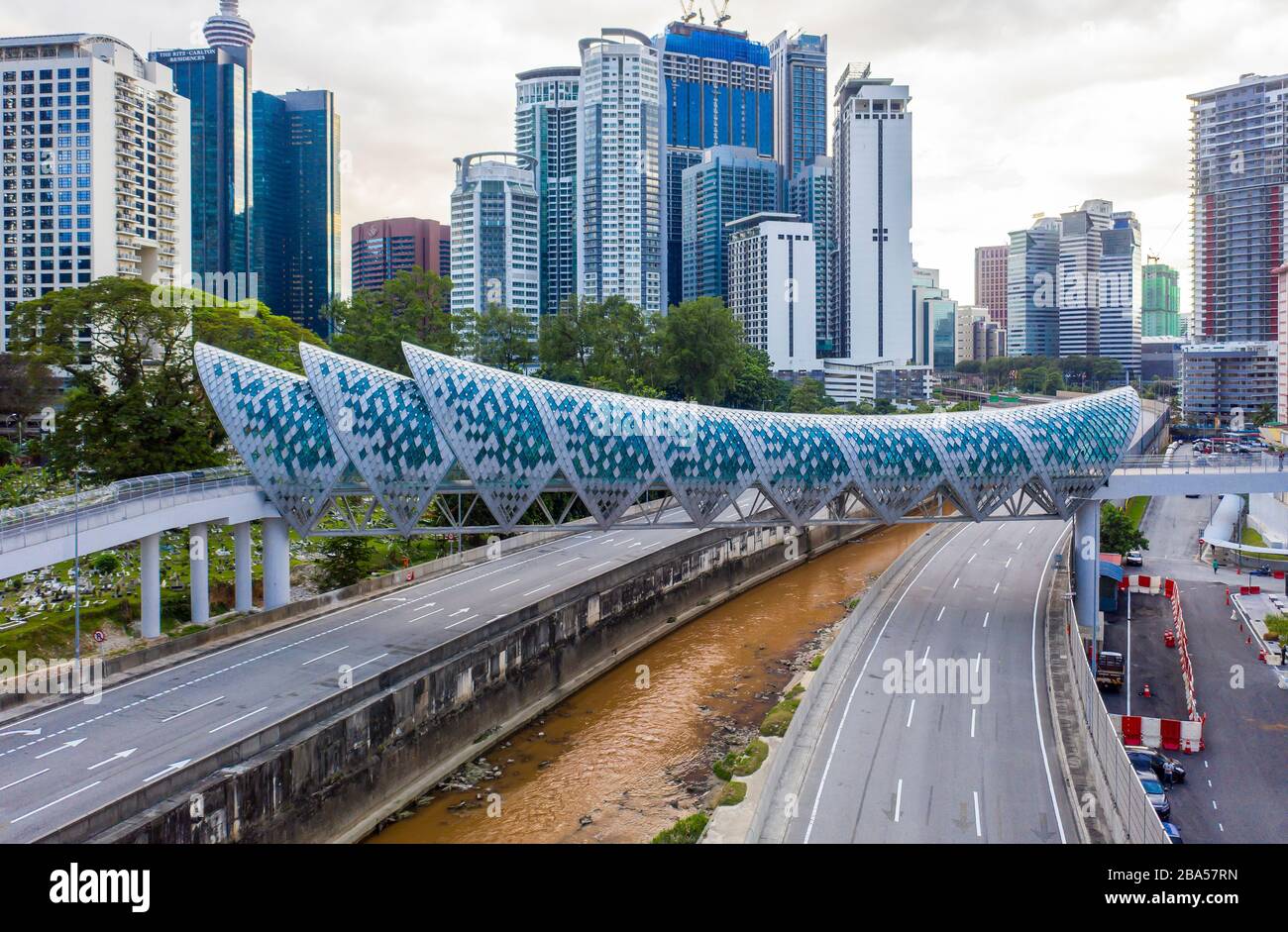 Kuala Lumpur, Malaysia - February 22, 2020 : Aerial drone view of newly opened pedestrian bridge ...