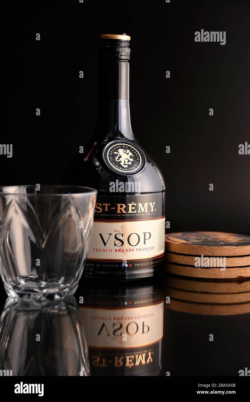 Studio shot of 750ml bottle of ST Remy VSOP French Brandy with class ...