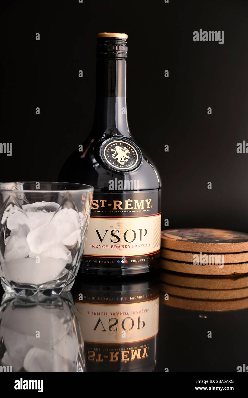 Studio shot of 750ml bottle of ST Remy VSOP French Brandy with class ...