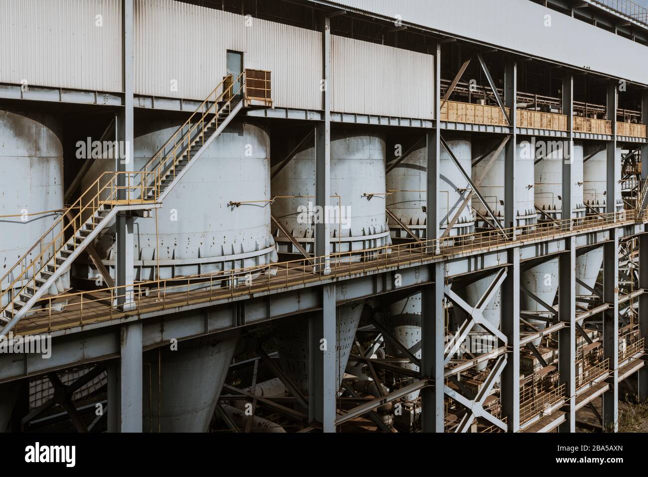 Interior of an old abandoned industrial steel factory Stock Photo - Alamy