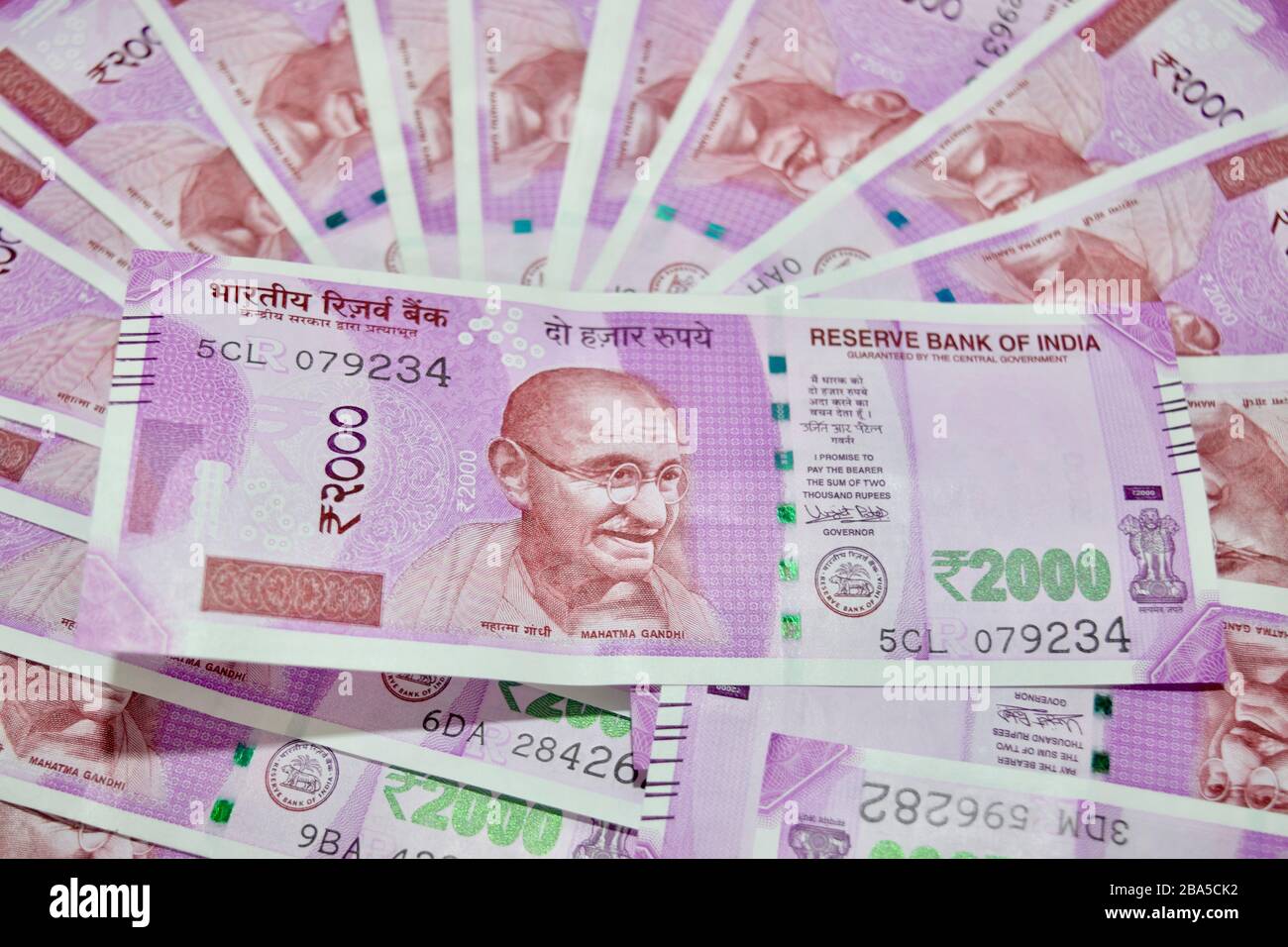 Full frame view of two thousands Indian paper currency Stock Photo - Alamy