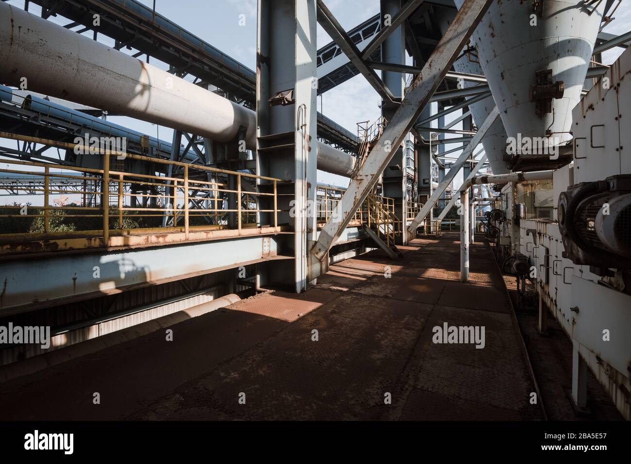 Interior of an old abandoned industrial steel factory Stock Photo - Alamy