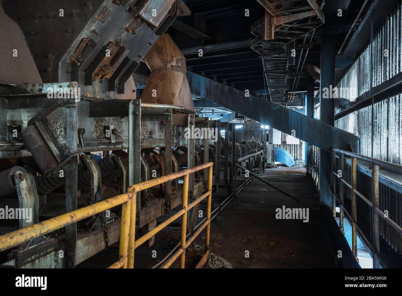 Interior of an old abandoned industrial steel factory Stock Photo - Alamy