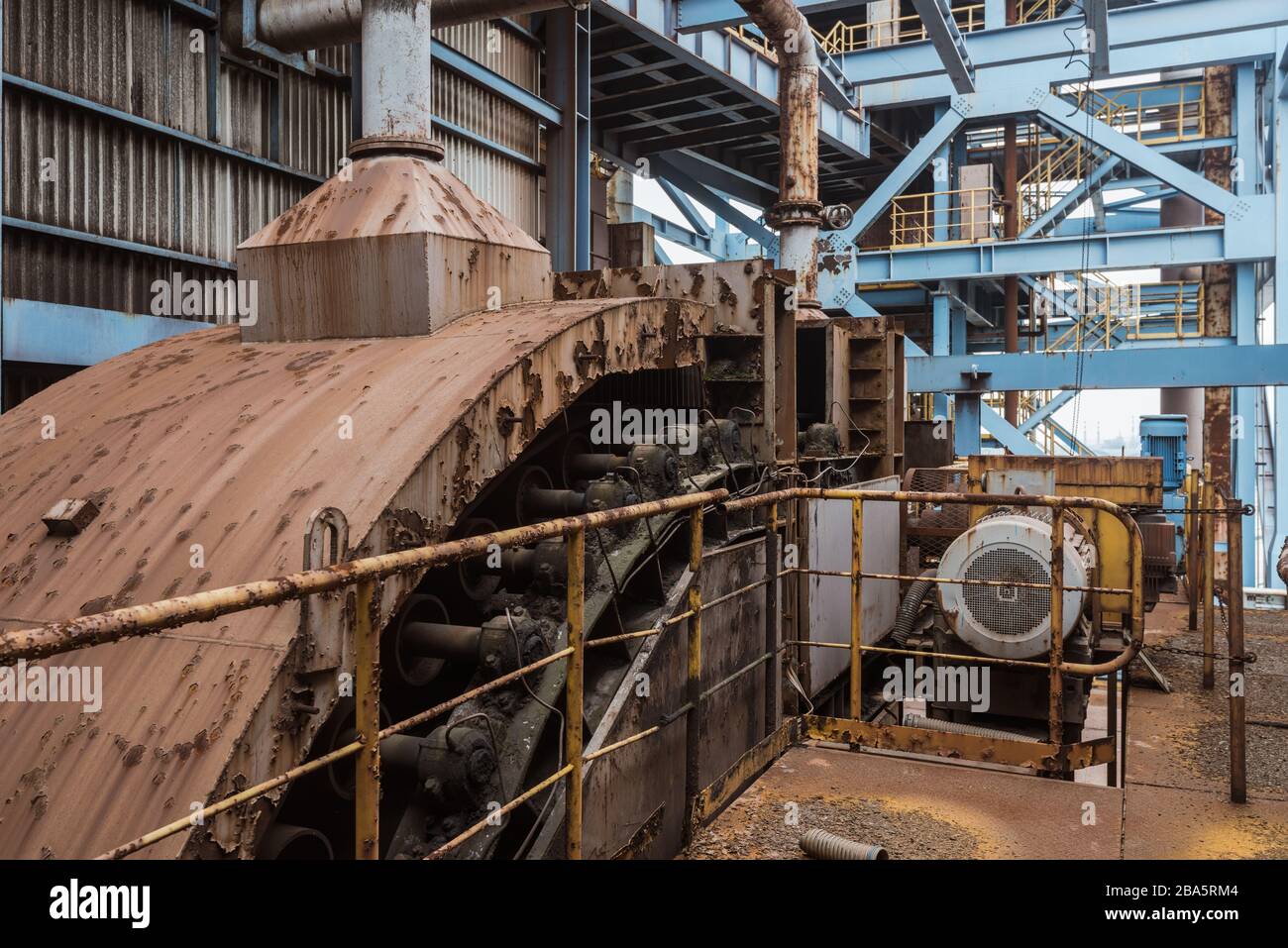 Interior of an old abandoned industrial steel factory Stock Photo - Alamy